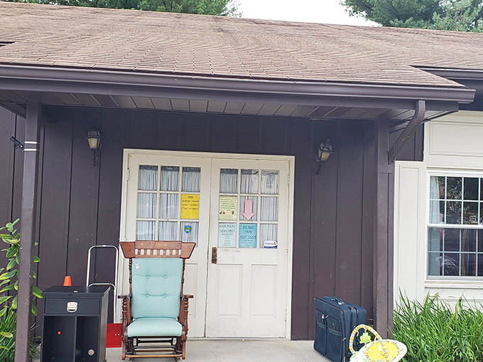The unassuming entrance with its vintage rocking chair is like a secret handshake &ndash; only thrift store aficionados recognize the promise that lies beyond those white doors.