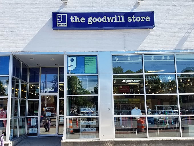 That iconic blue sign on Commonwealth Ave beckons bargain hunters like a lighthouse guides ships to shore.