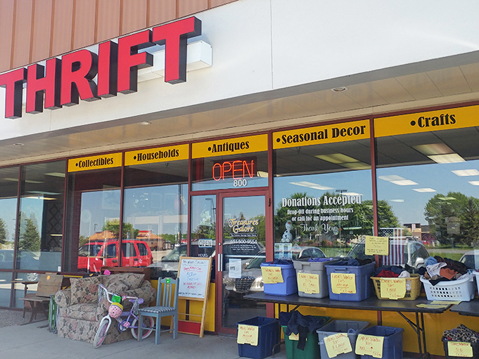 The storefront promises adventure with its bold "THRIFT" sign and colorful category banners. Donations welcome, treasures inevitable!