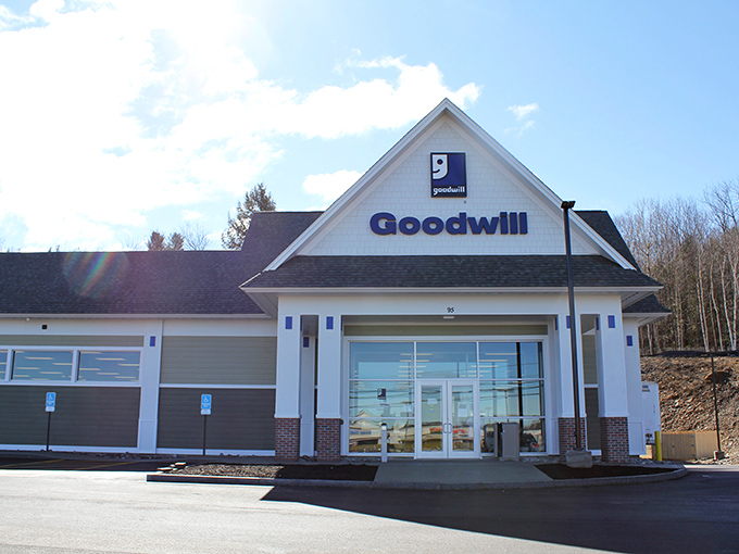 The classic New England architecture of Goodwill Belmont welcomes treasure hunters with its clean white siding and signature blue lettering. X marks the spot!