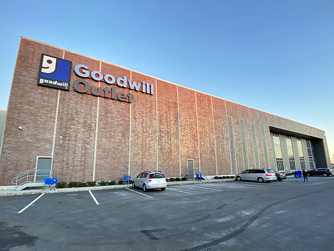 The unassuming brick fortress of bargains stands ready for treasure hunters. No fancy frills, just pure thrifting potential waiting inside.