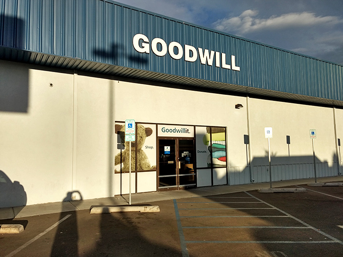 The iconic blue trim of Santa Fe's Goodwill stands out against the New Mexico sky like a beacon for bargain hunters everywhere.