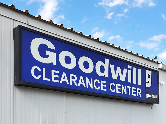 The iconic blue sign beckons treasure hunters like a retail lighthouse, promising adventures in secondhand shopping that would make Indiana Jones jealous.