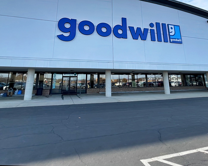 The iconic blue Goodwill sign beckons like a siren call to bargain hunters. This isn't just shopping&mdash;it's a treasure hunt with purpose.