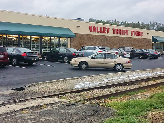 The iconic red lettering against beige brick announces your arrival at bargain paradise. Like a retail oasis in Kettering, Valley Thrift Store beckons with promises of treasures within.