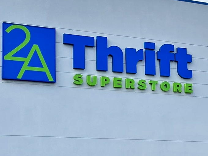 The iconic blue and green sign beckons bargain hunters like a lighthouse guiding ships to treasure-filled shores.