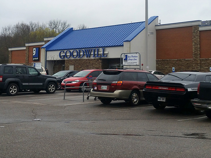 The bright blue roof of Goodwill on Stage Road shines like a beacon, guiding thrifters toward a sea of hidden treasures.