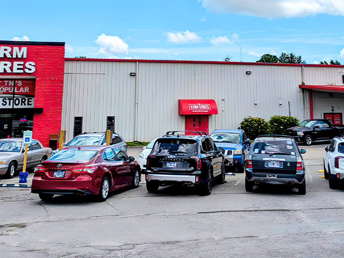 The bright red facade of KARM Stores beckons like a treasure chest waiting to be opened. Thrifting adventures begin here!