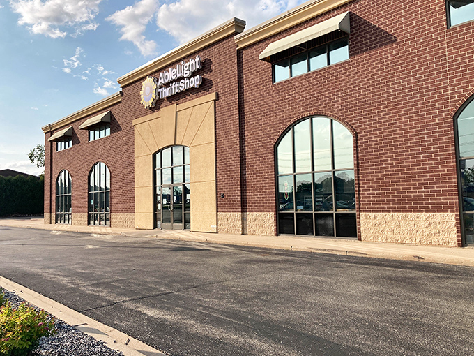 The brick facade of AbleLight Thrift Shop stands proudly in Appleton, where fashion dreams and budget realities live in perfect harmony.