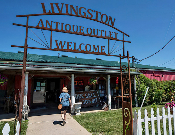 The iconic rusty welcome sign beckons treasure hunters like a siren call to vintage paradise. Michigan's ultimate time-travel portal awaits.