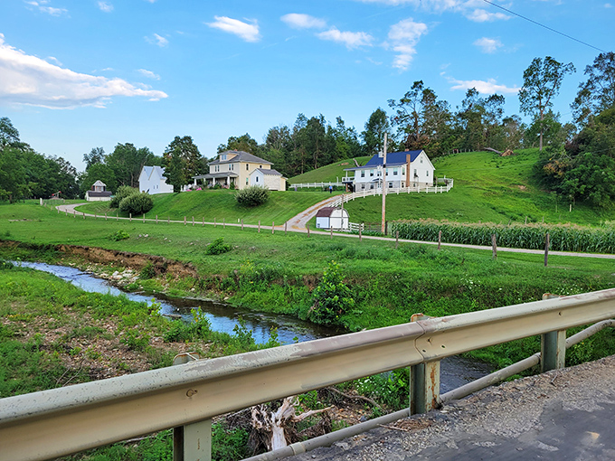 Rolling hills cradle pristine white farmhouses while a gentle stream meanders through the landscape – Ohio's Amish Country looks like a painting come to life.