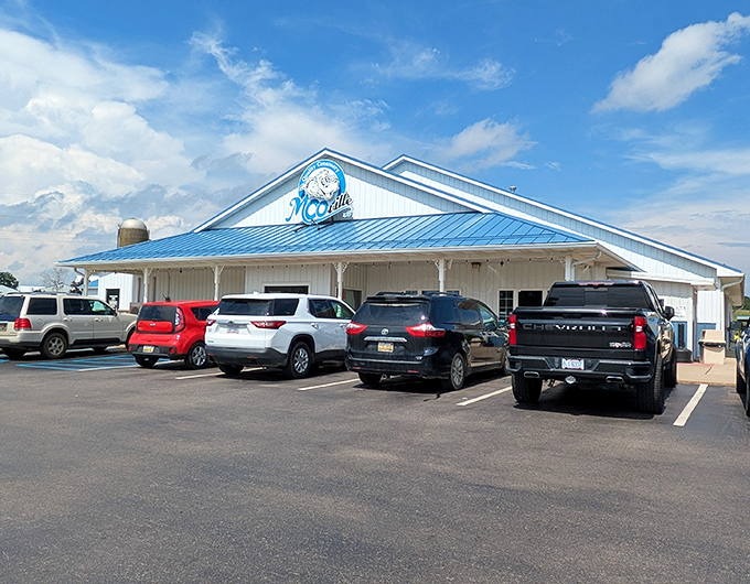 The blue-roofed MOO-ville Creamery stands as a dairy landmark in Nashville, Michigan&mdash;serving up creamy delights and pure nostalgia in every scoop.