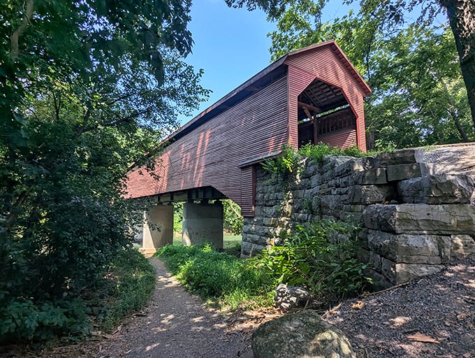 From below, the bridge appears to float above the Shenandoah's gentle current. Mother Nature's perfect frame job&mdash;water, wood, and sky in harmonious balance.