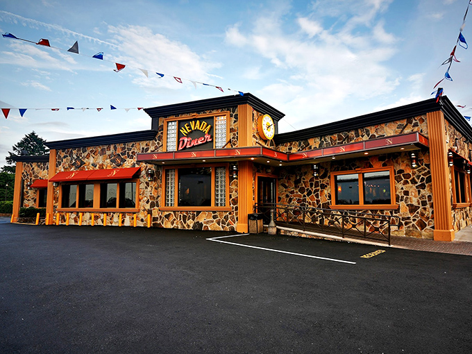 The neon glow of Nevada Diner's sign against its stone facade is like a lighthouse for hungry travelers on Bloomfield's Broad Street. Classic Jersey diner perfection.