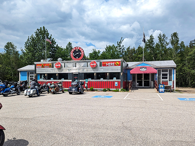 Classic Americana on full display! The 104 Diner's shiny exterior and cherry-red awning stand ready to welcome hungry travelers and motorcycle enthusiasts alike