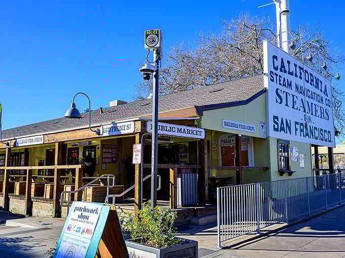Railroad Fish & Chips stands proudly in Sacramento's historic district, its cheerful yellow exterior promising seafood treasures within like a maritime beacon for hungry travelers.