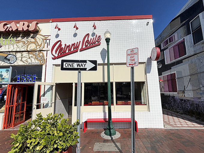 That iconic red script against white tile isn't just signage&mdash;it's a beacon calling all burger enthusiasts to their happy place.