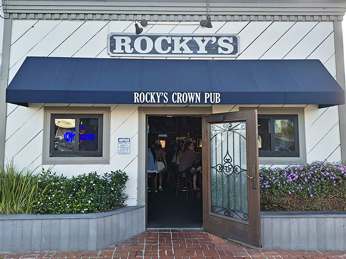 That blue awning isn't trying to impress anyone &ndash; it's too busy hiding burger greatness inside this Pacific Beach gem.