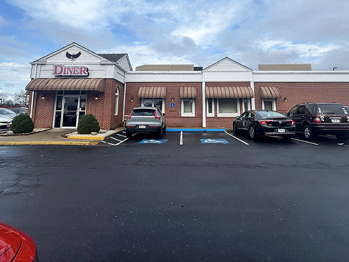 The iconic Eagle Diner sign perched above striped awnings promises comfort food salvation to hungry Warminster travelers. A Pennsylvania breakfast landmark worth the journey.