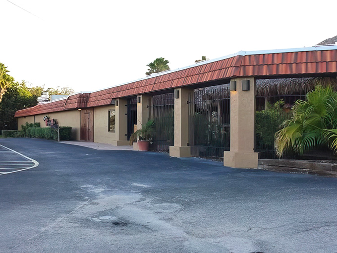 The unassuming exterior of Cowpoke's Watering Hole proves that Florida's best culinary treasures often hide behind modest facades. Steak paradise awaits!