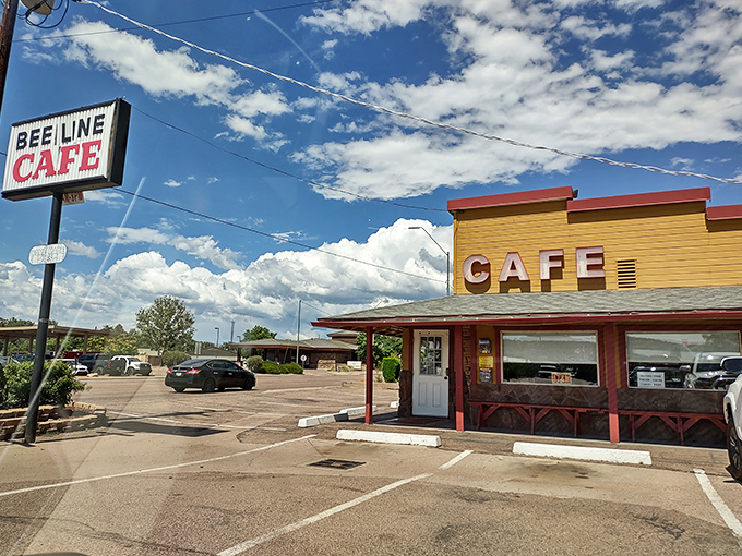 The sunshine-yellow exterior of Beeline Cafe stands like a beacon of breakfast hope against Arizona's blue sky, promising comfort food salvation to weary travelers.