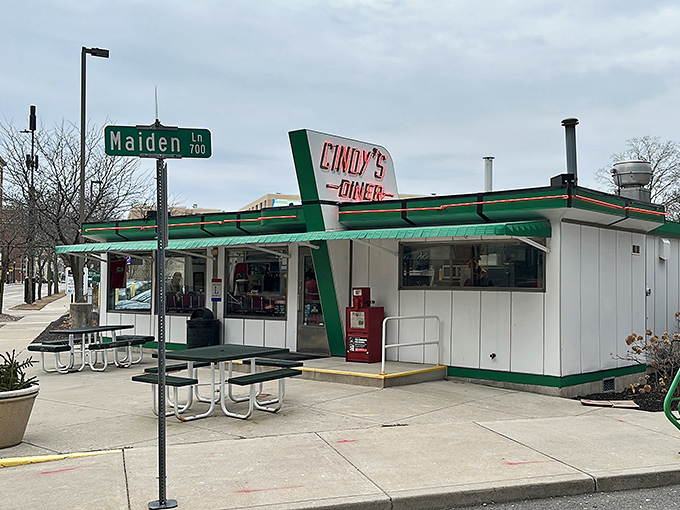The mint-green exterior of Cindy's Diner stands like a time capsule in downtown Fort Wayne, promising nostalgic flavors and the comfort of simpler times.