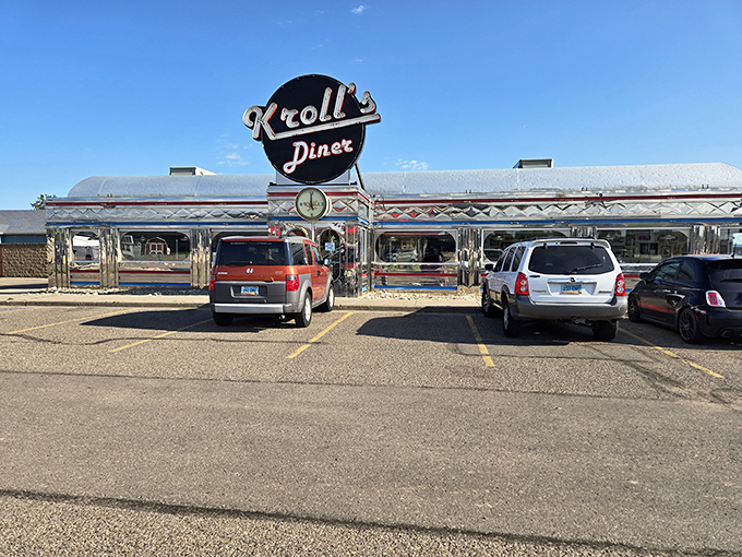 The gleaming chrome exterior of Kroll's Diner shines like a beacon of hope for hungry travelers, promising nostalgic comfort in every bite.