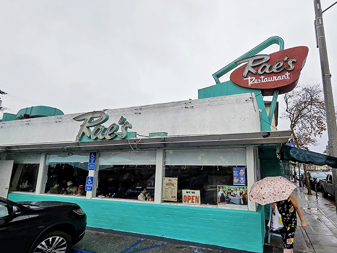 Even on a rainy day, Rae's neon glow cuts through the gloom, a beacon of breakfast hope when avocado toast just won't cut it.