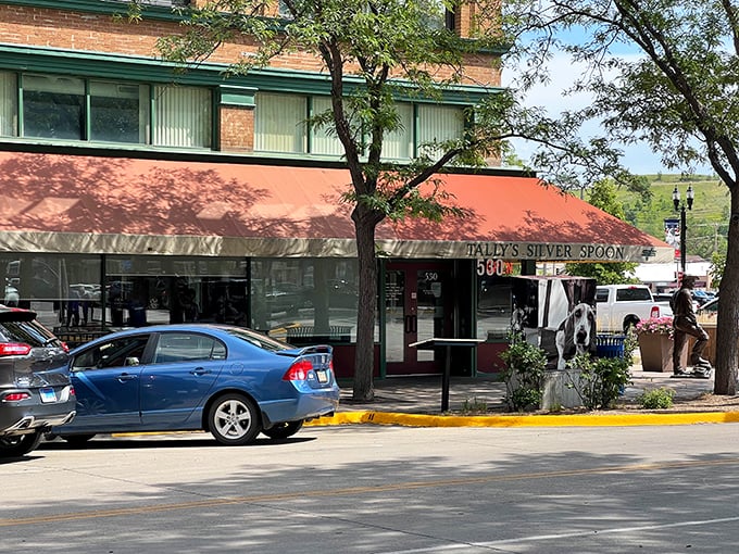 The classic brick exterior with its distinctive red awning has become a landmark for locals seeking breakfast salvation after a long night or early morning.