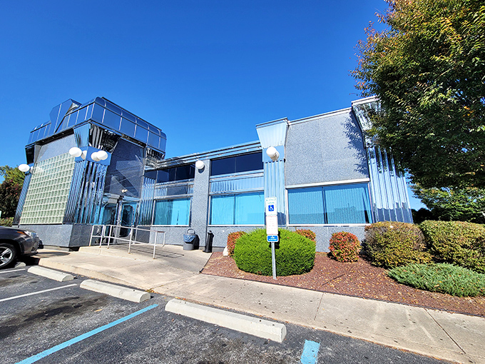 The sleek, silver-gray exterior of Springfield Diner gleams like a time capsule from the golden age of roadside dining. Classic Americana at its finest.
