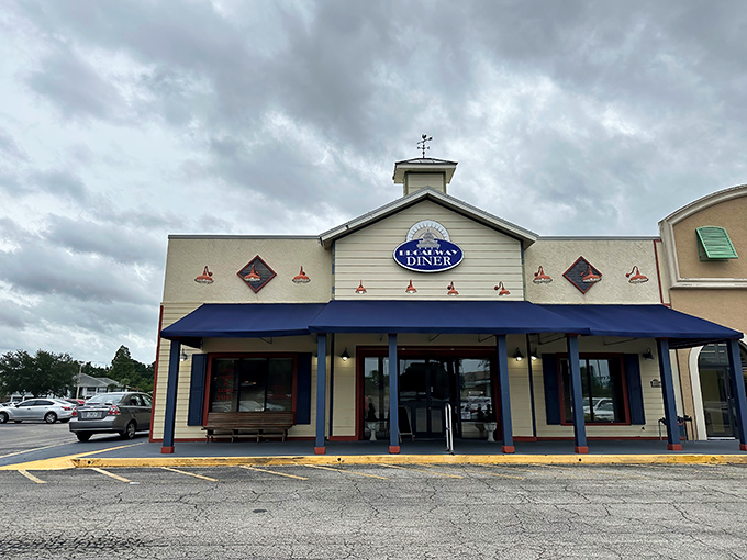 The classic blue awning and charming facade of Broadway Diner stands like a beacon for breakfast pilgrims. Florida mornings were made for places exactly like this.