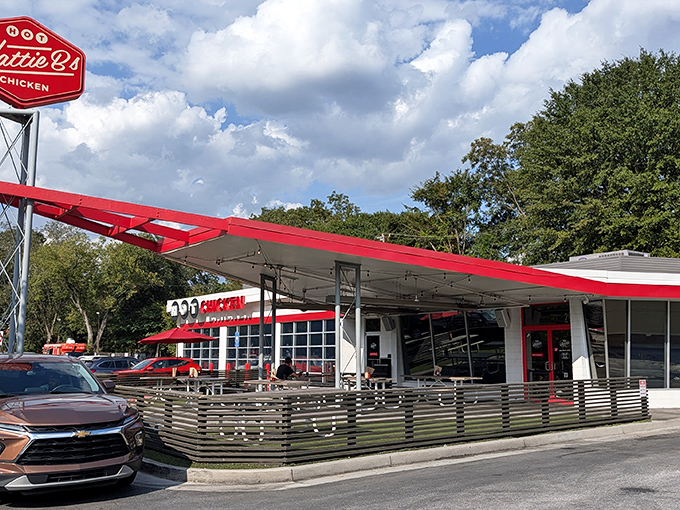 That iconic red and white exterior isn't just a restaurant—it's a beacon of hope for hungry souls seeking spicy salvation in Atlanta's Little Five Points.