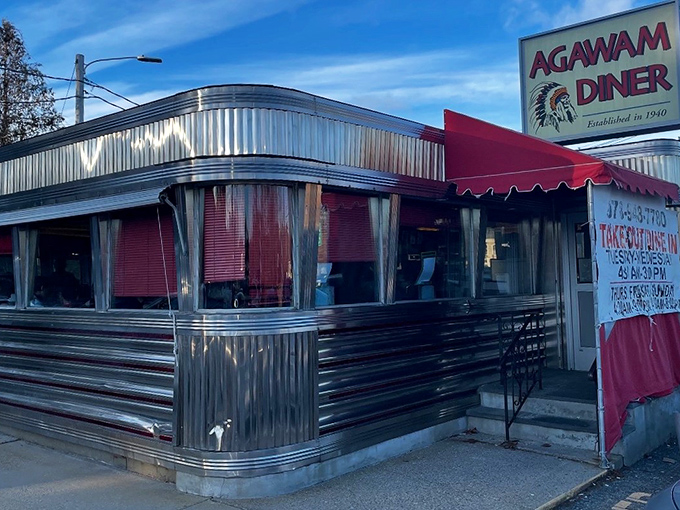 The gleaming stainless steel exterior of Agawam Diner shines like a time machine to the golden age of roadside Americana. Classic diner architecture at its finest!