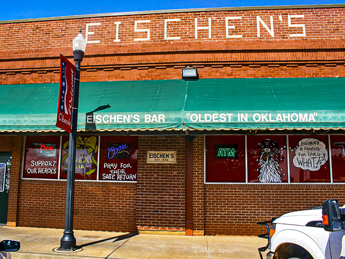 The iconic green awning of Eischen's Bar stands as a beacon for fried chicken pilgrims. Oklahoma's oldest bar doesn't need fancy signage when the food speaks volumes.