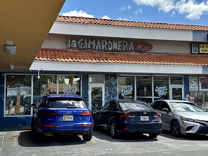 The unassuming storefront might not scream "culinary destination," but those luxury cars in the parking lot tell a different story. Seafood pilgrims know where to find salvation.