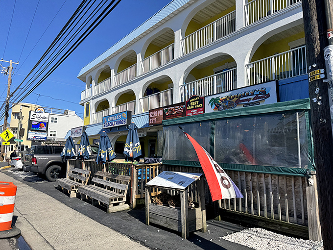 Woody's exterior welcomes beach-goers with its no-frills charm, promising delicious rewards for those who venture inside this Dewey Beach institution.
