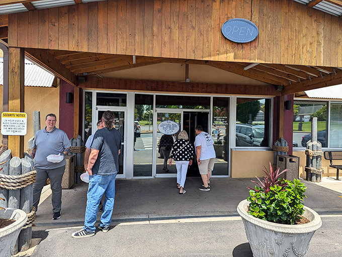 The wooden-framed entrance to Captain Steve's welcomes hungry patrons like a lighthouse beckoning ships to shore. Simple, unpretentious, and promising seafood treasures within.