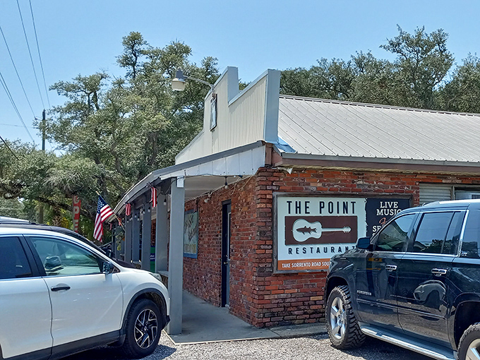 The unassuming brick exterior of The Point Restaurant proves once again that Florida's best seafood treasures often hide in plain sight.
