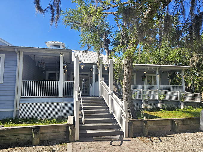 The stairway to seafood heaven beckons with Old Florida charm. Those white railings have guided countless hungry pilgrims to crab cake nirvana.