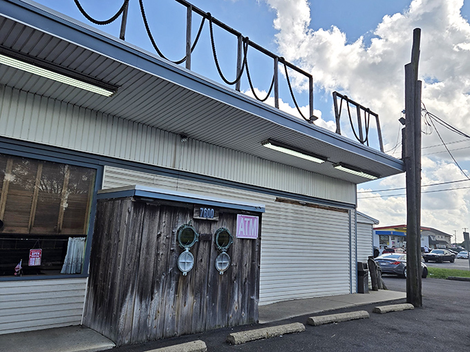 The weathered wood and nautical ropes at Under the Pier&rsquo;s entrance hint at the seaside spirit and seafood delights within.