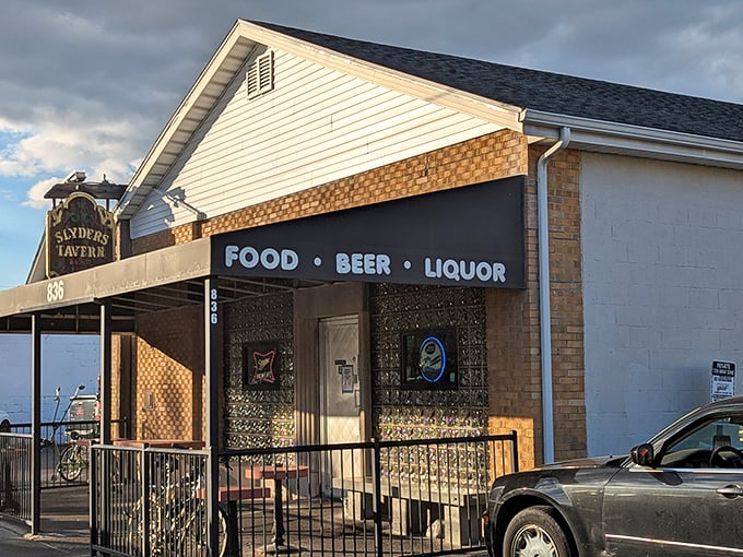 A different angle reveals Slyder's true priorities: FOOD &bull; BEER &bull; LIQUOR, the holy trinity of neighborhood tavern perfection.