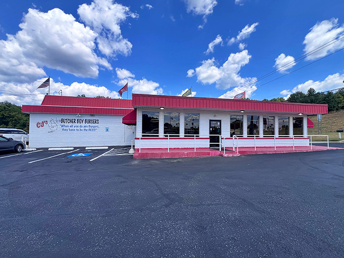 The classic red-and-white exterior of CJ's stands like a beacon of burger hope on North Arkansas Avenue, promising delicious nostalgia with every visit.