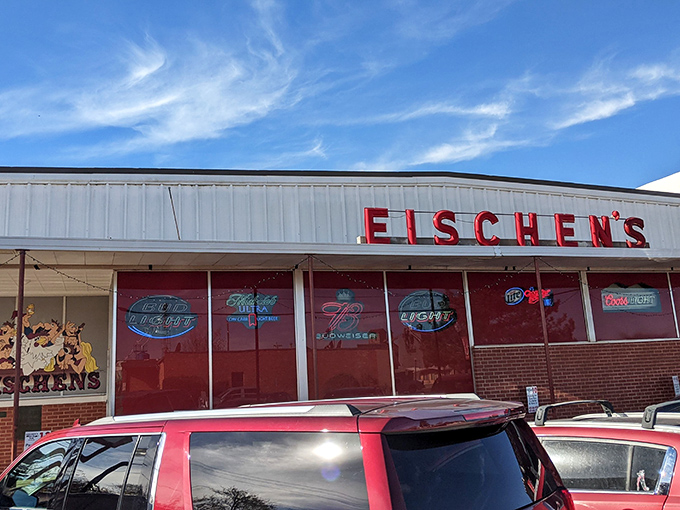 The iconic green awning of Eischen's Bar stands as a beacon for fried chicken pilgrims. Oklahoma's oldest bar doesn't need fancy signage when the food speaks volumes.