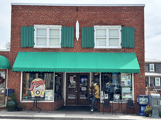 The green awning beckons like a breakfast lighthouse, guiding hungry souls to their morning salvation in downtown Swansboro.