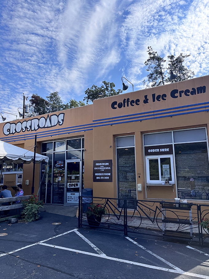 Under Richmond's blue skies, Crossroads welcomes visitors with its cheerful facade&mdash;proof that sometimes the best culinary adventures happen in buildings the color of French's mustard.