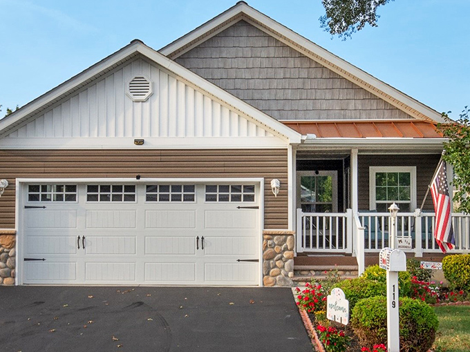 Another charming Southern Meadow residence sporting that perfect blend of curb appeal and accessibility&mdash;the American flag adds that "welcome home" touch.