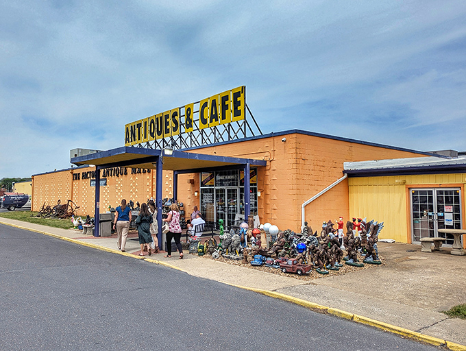 The peachy-orange exterior of Factory Antique Mall stands like a beacon to treasure hunters, promising adventures in time travel without the pesky paradoxes.