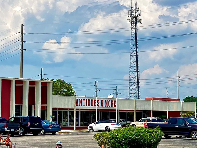 The unassuming exterior of Wildwood Antique Mall hides its treasures like a poker player with a royal flush. Florida sunshine bounces off the "ANTIQUES & MORE" sign, promising adventures within.