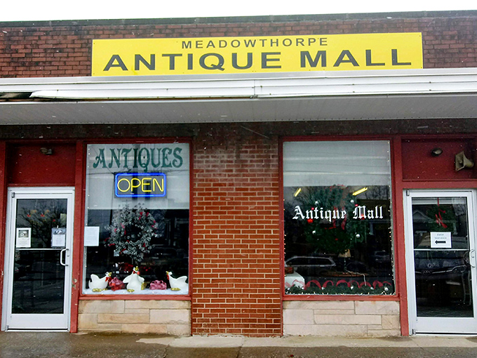 The unassuming brick facade of Meadowthorpe Antique Mall hides a universe of treasures within. Like a time-travel portal disguised as a storefront.