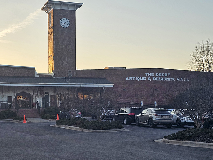 The iconic clock tower stands sentinel over The Depot, a brick behemoth that's less "antique store" and more "time machine with price tags."